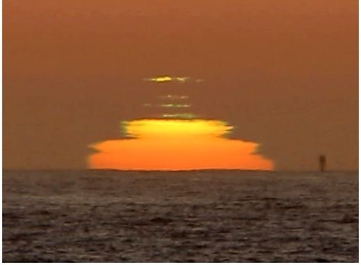 Cuádruple destello verde