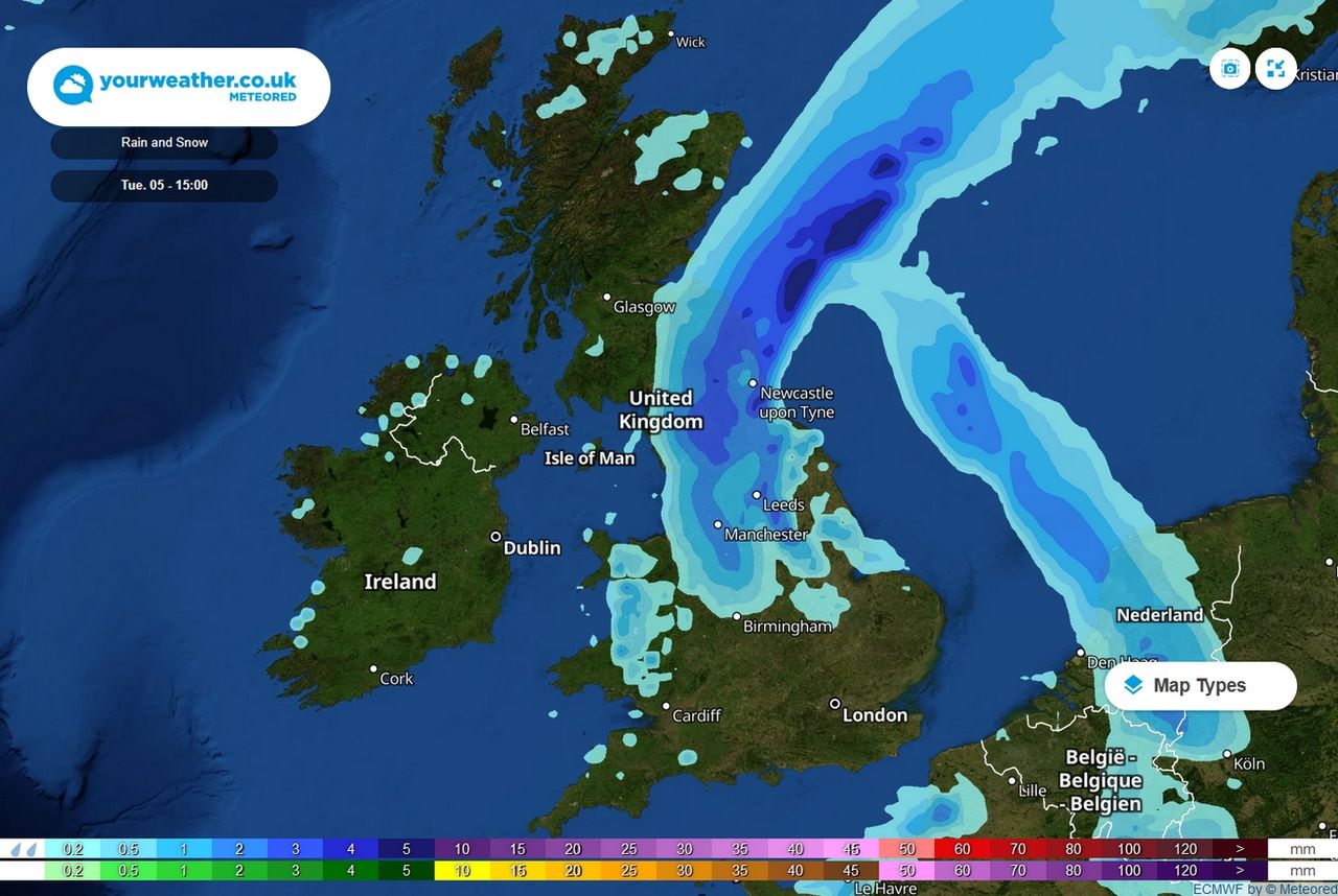 UK forecast: windy and cool with torrential downpours